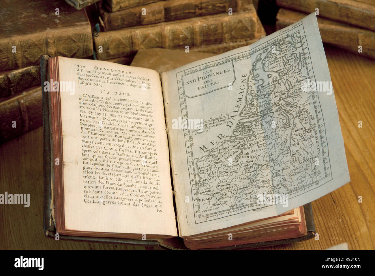 Old antique vintage books with maps of Italy and Europe Stock Photo - Alamy