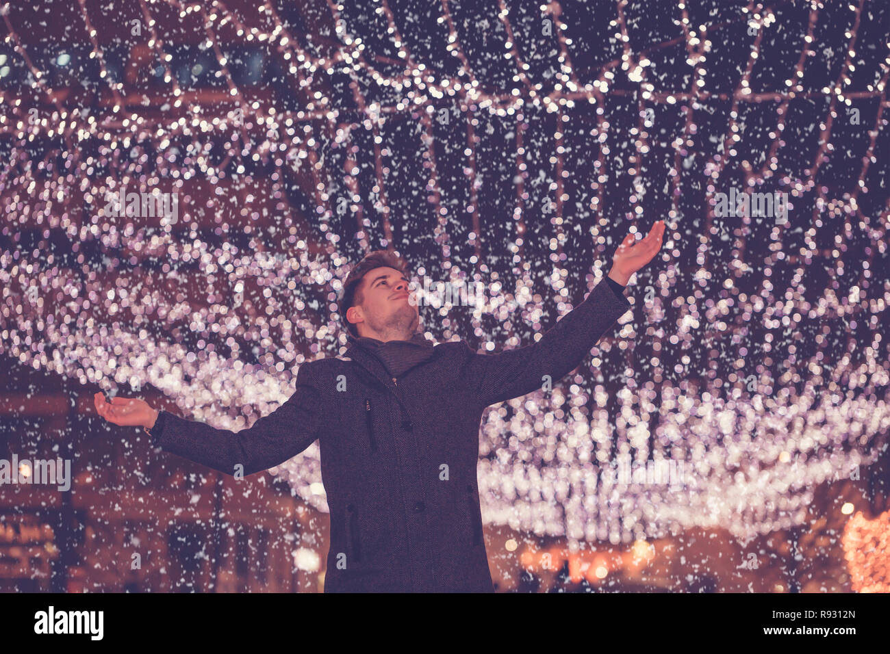 Man standing under street light hi-res stock photography and images - Alamy