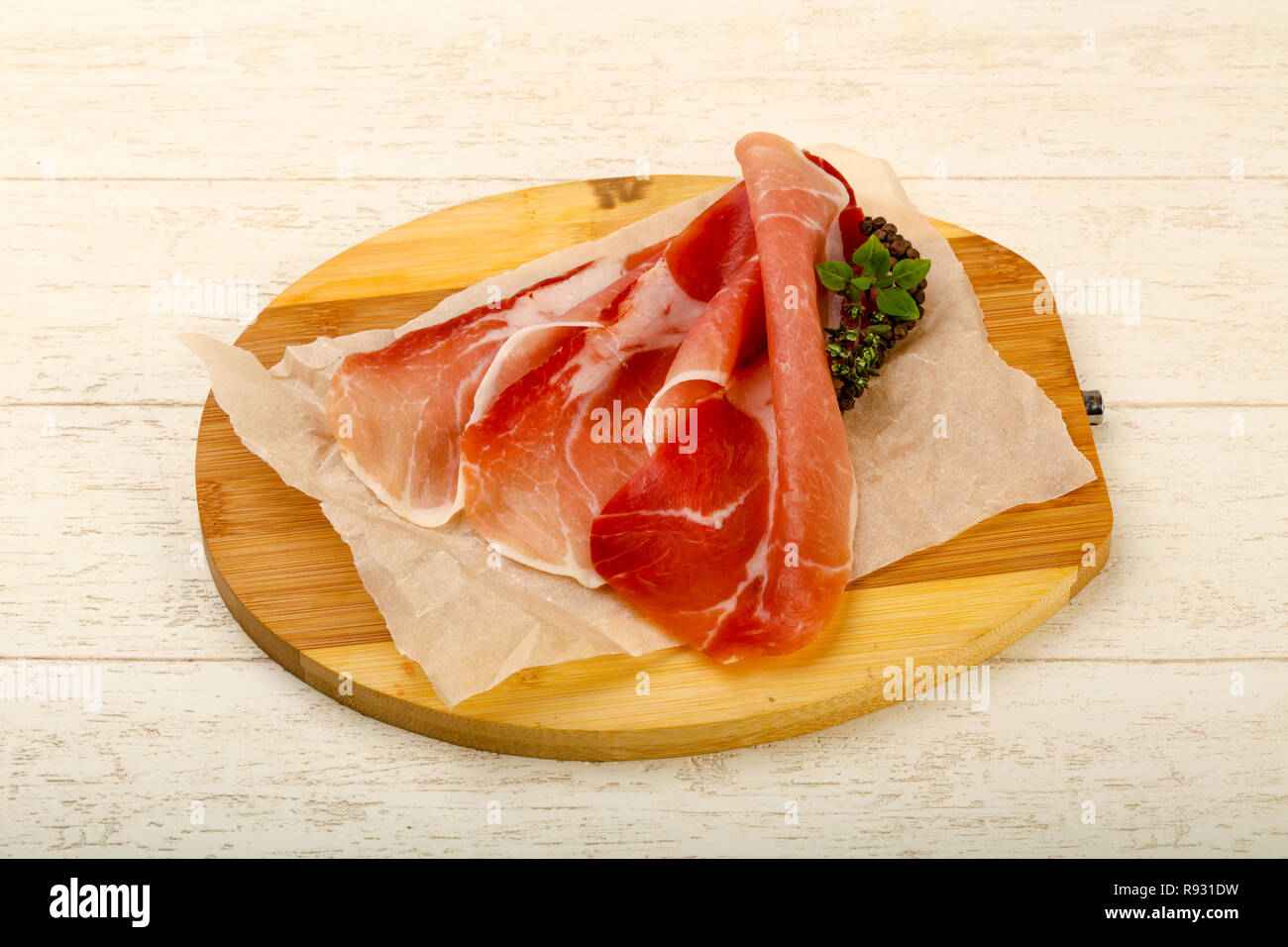 Spanish hamon ready for eat ovet the wooden background Stock Photo - Alamy