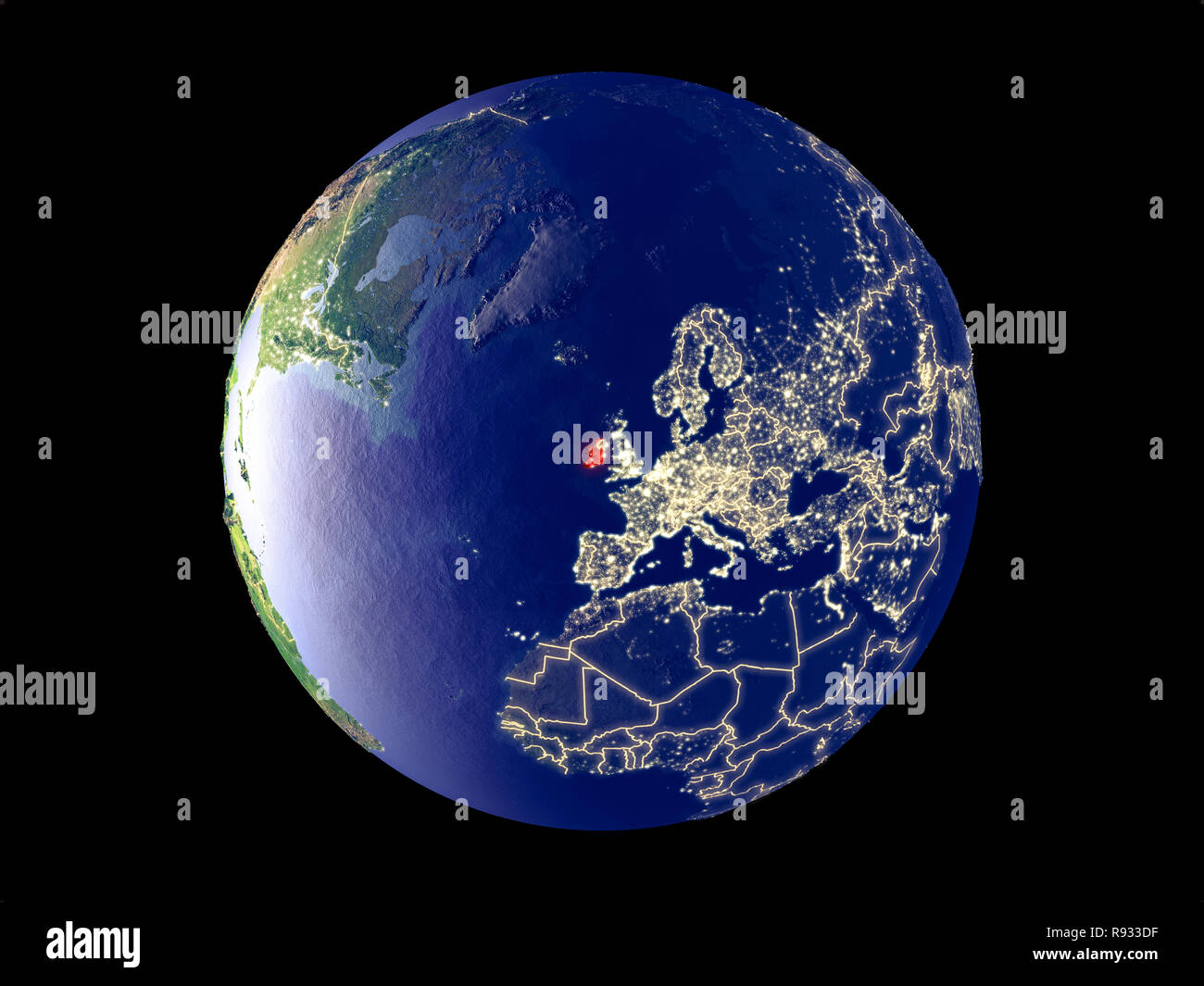 Ireland from space on model of planet Earth with city lights. Very fine ...