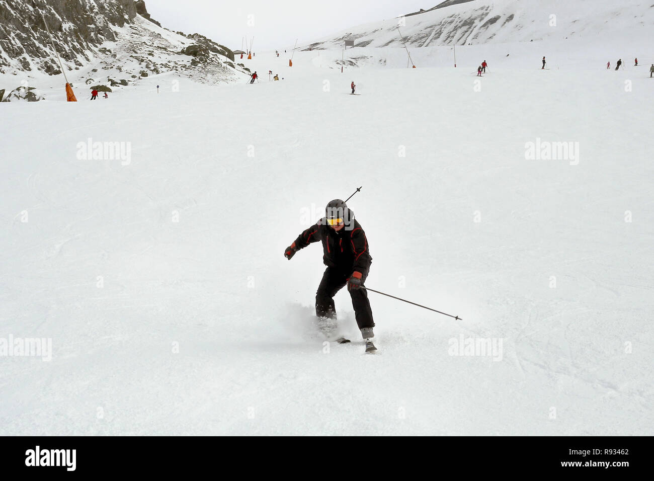 Mature skier fallen during downhill at ski resort in winter. Accident ...