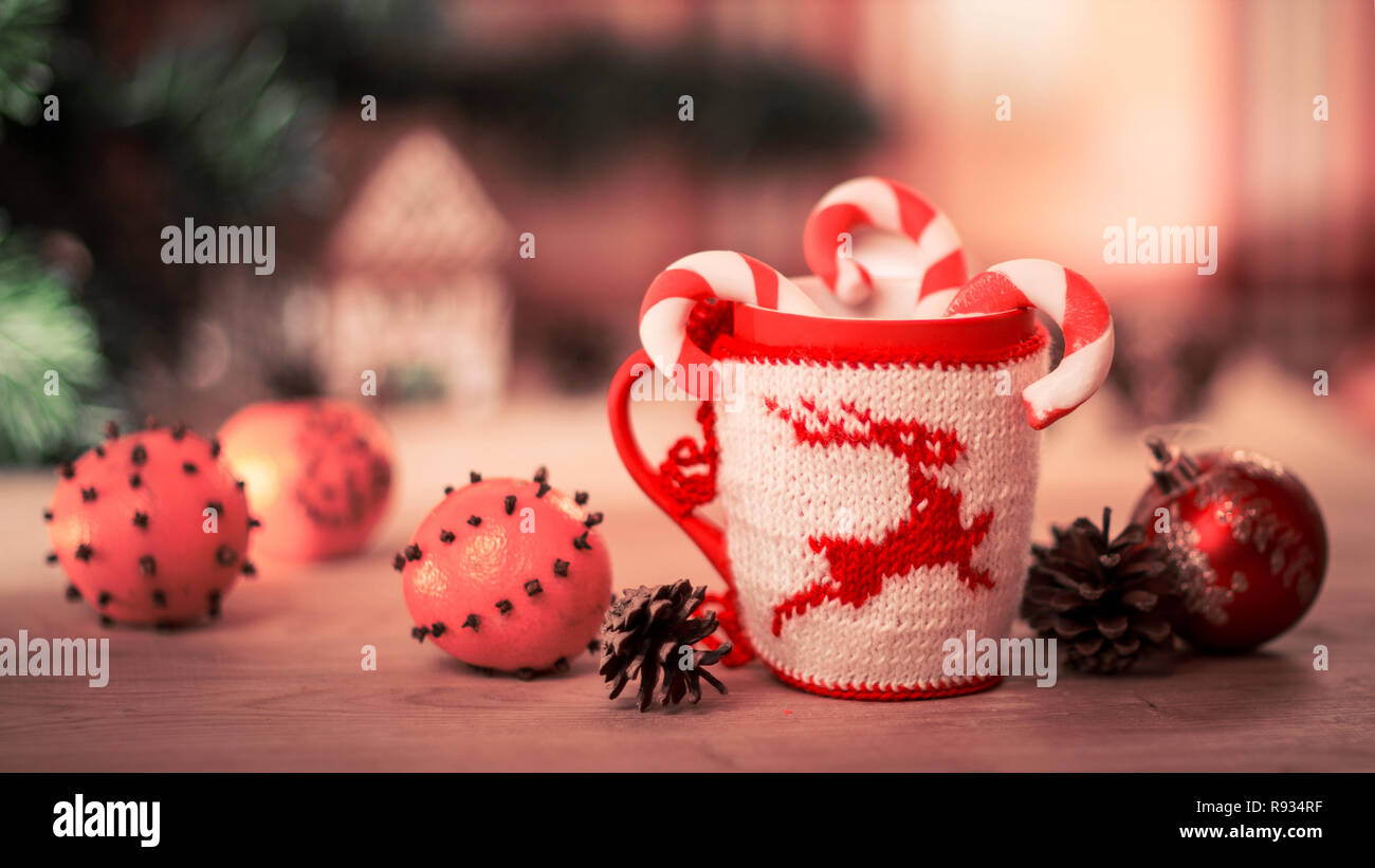 insulated wool cloth mug with embroidered deer on the wooden table mug ...