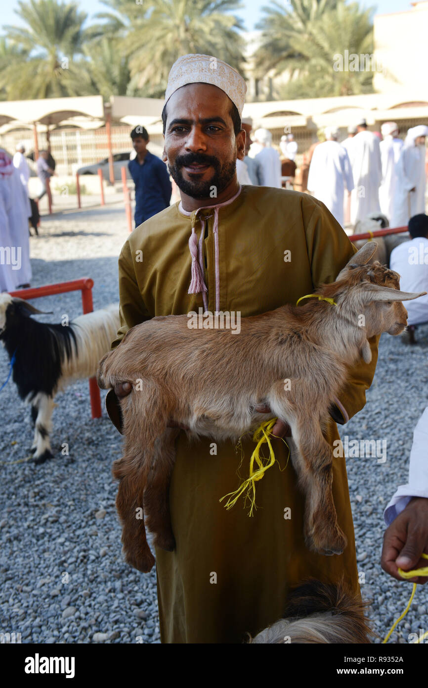 The busy Nizwa cattle market takes place every Friday morning by the ...