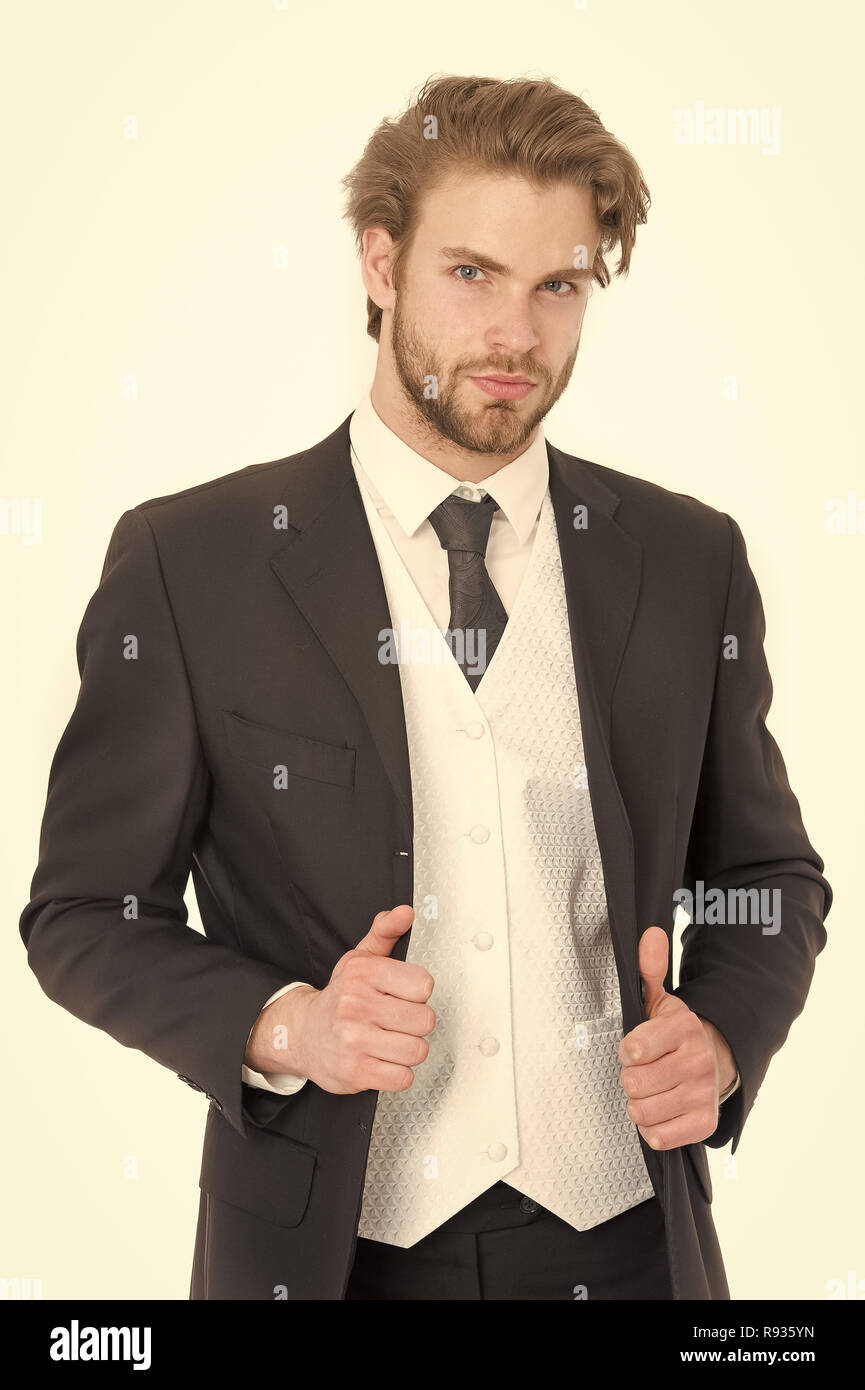 businessman in black formal outfit with serious face isolated on white ...