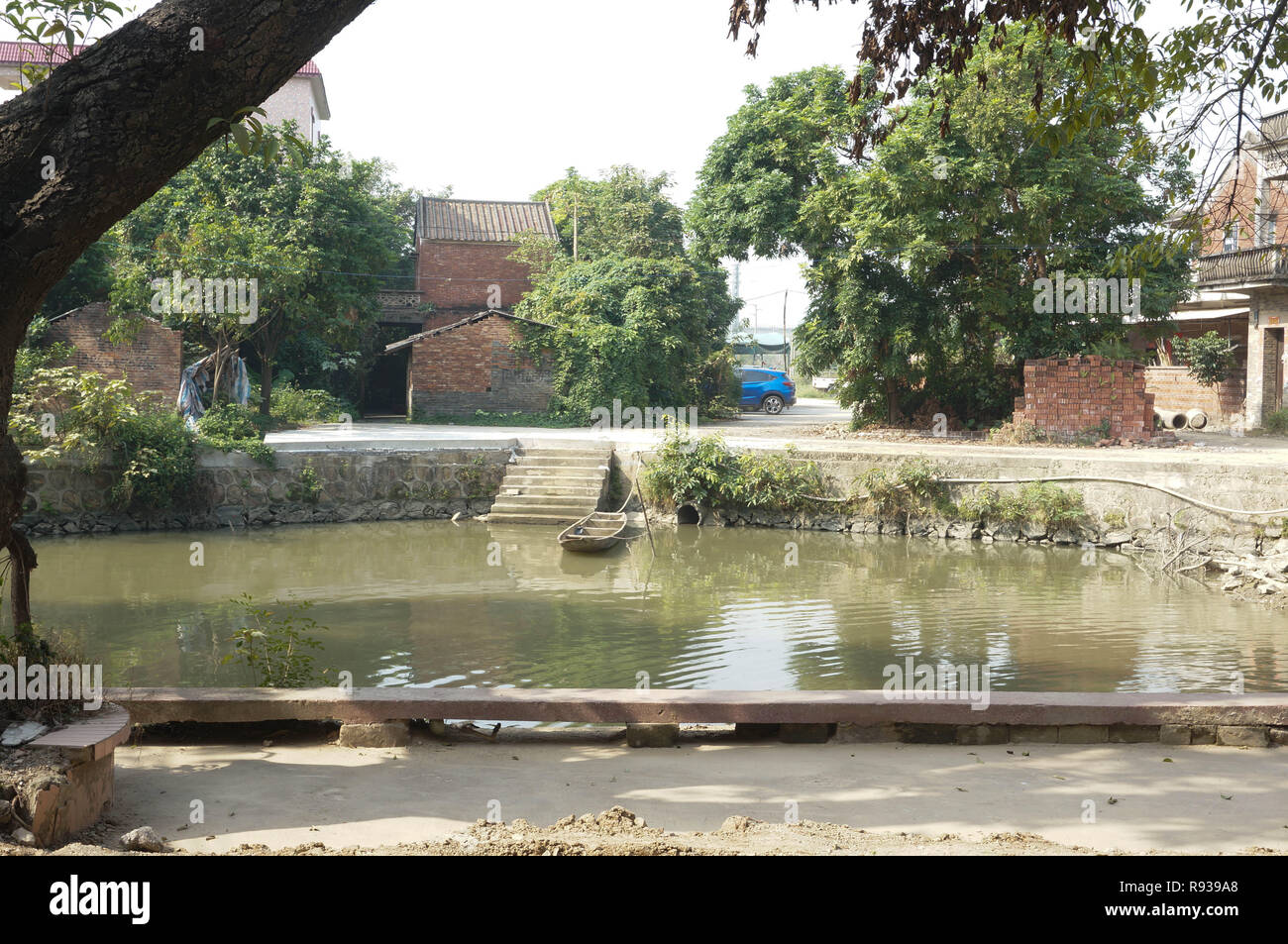 A lake by the village Stock Photo - Alamy