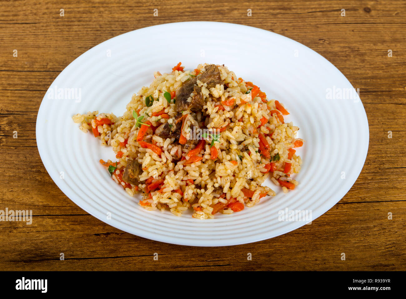 Asian rice - Plov with meat and carrot Stock Photo - Alamy
