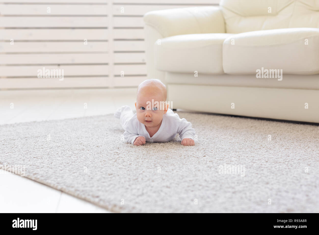 Childhood, babyhood and people concept - little baby boy or girl ...