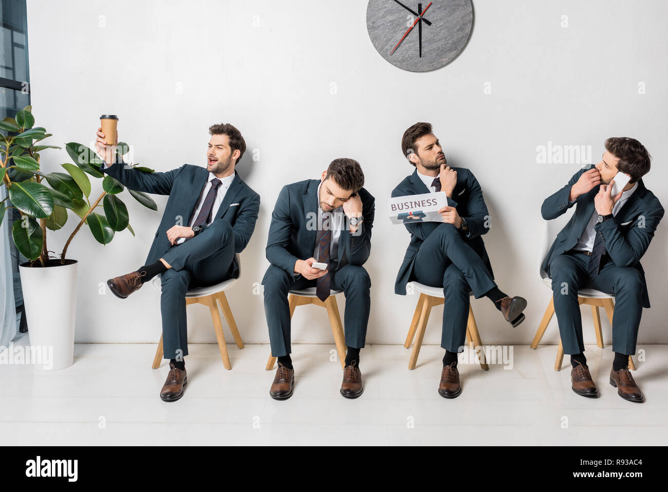 Bored people waiting in queue hi-res stock photography and images - Alamy