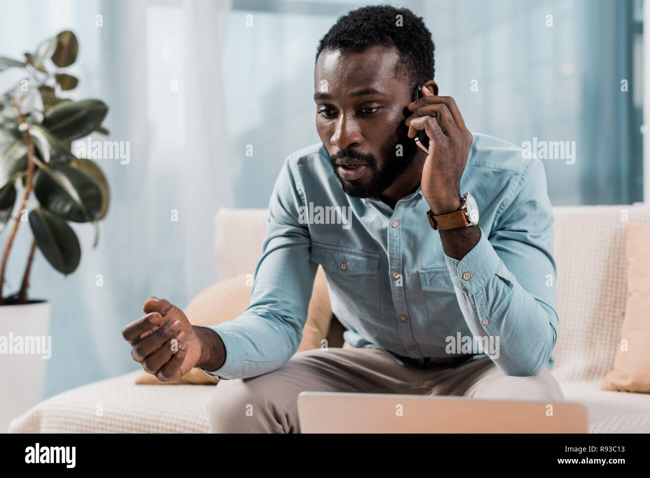 Sad african american man talking hi-res stock photography and images ...