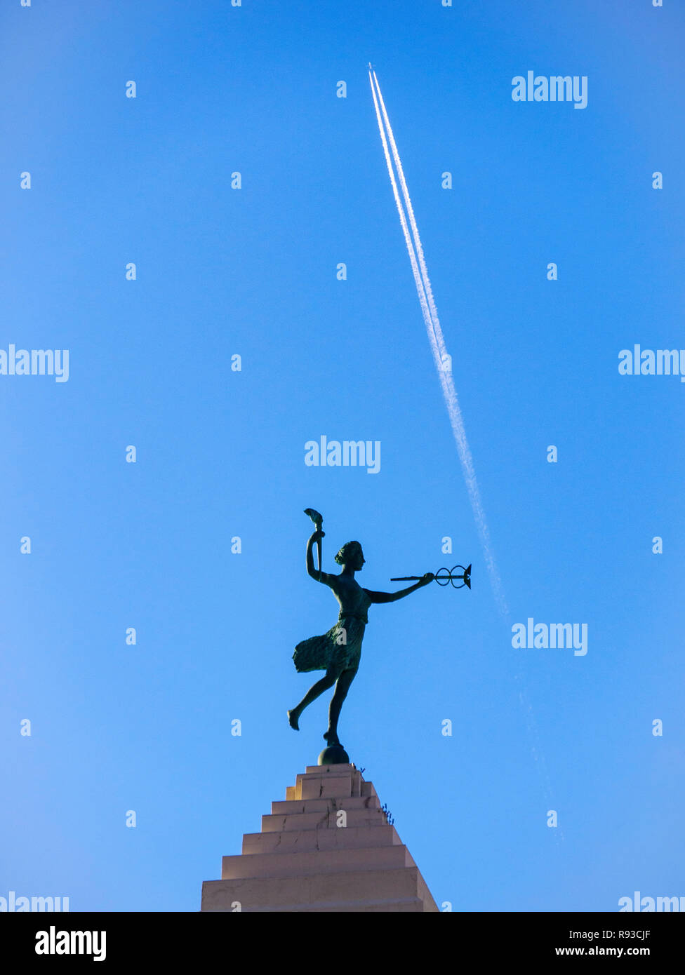Spirit of Progress statue and aircraft contrail. Old Montgomery Ward ...