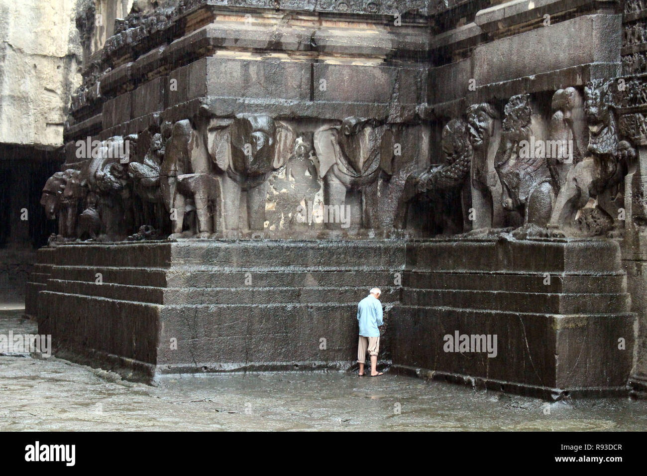 A (probably) ignorant (and lazy) Indian man peeing on the majestic ...