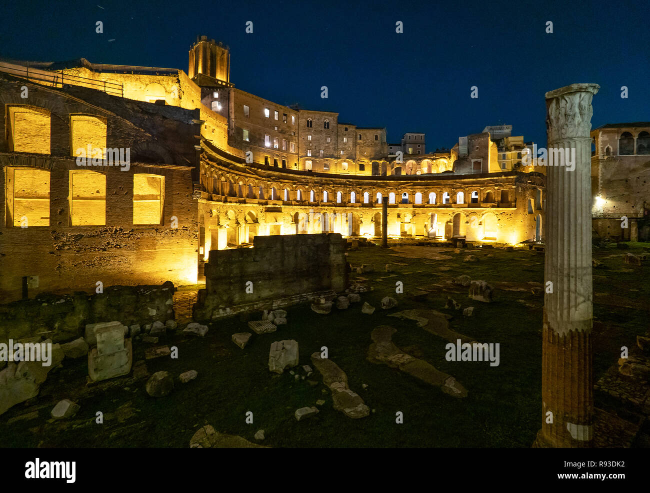 Rome (Italy) - The archeological ruins of historic center named Imperial Fora in the night with ...