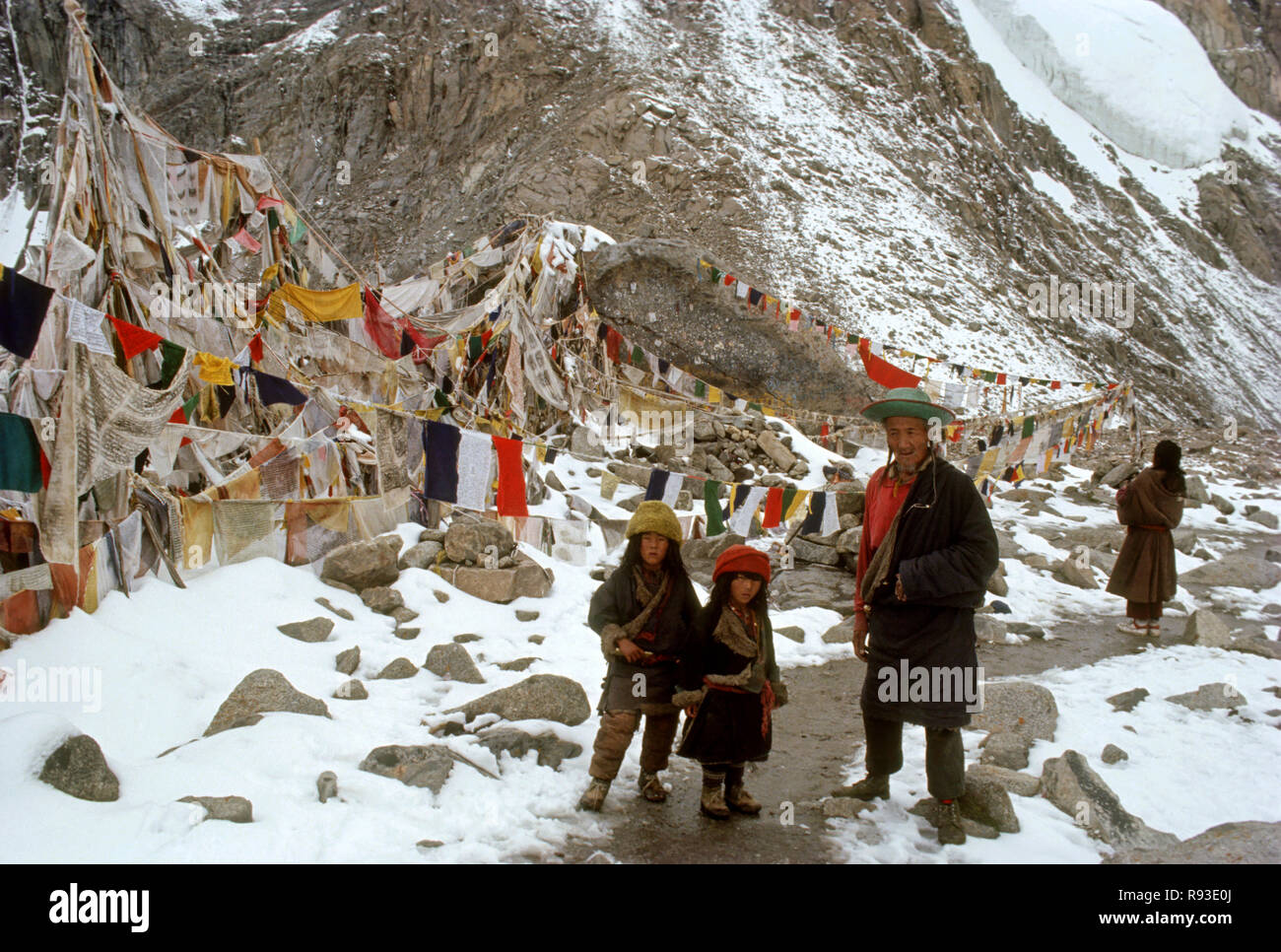 man standing with his children at dolma pass, trek to kailash, tibet ...