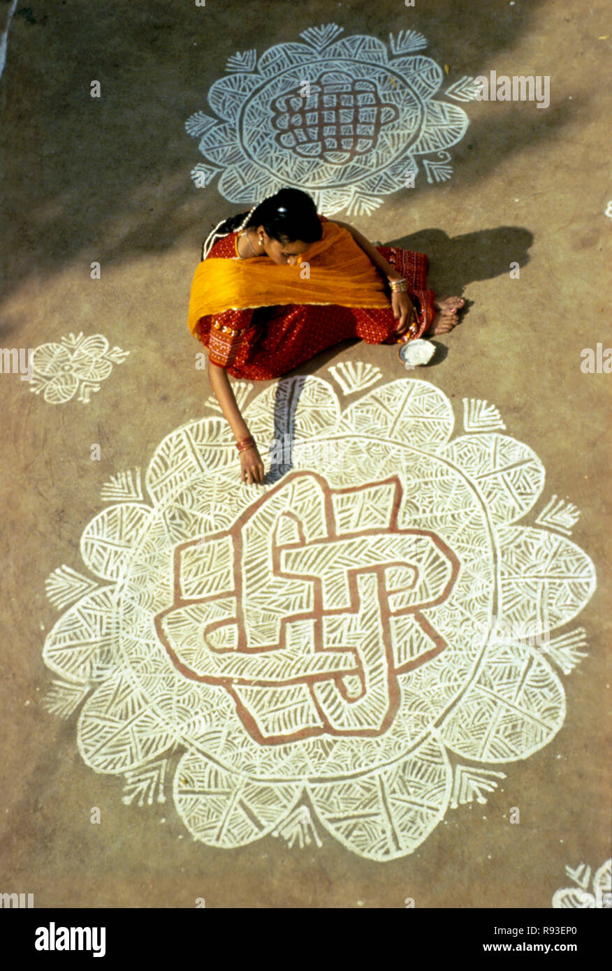 Indian girls making rangoli hi-res stock photography and images - Alamy
