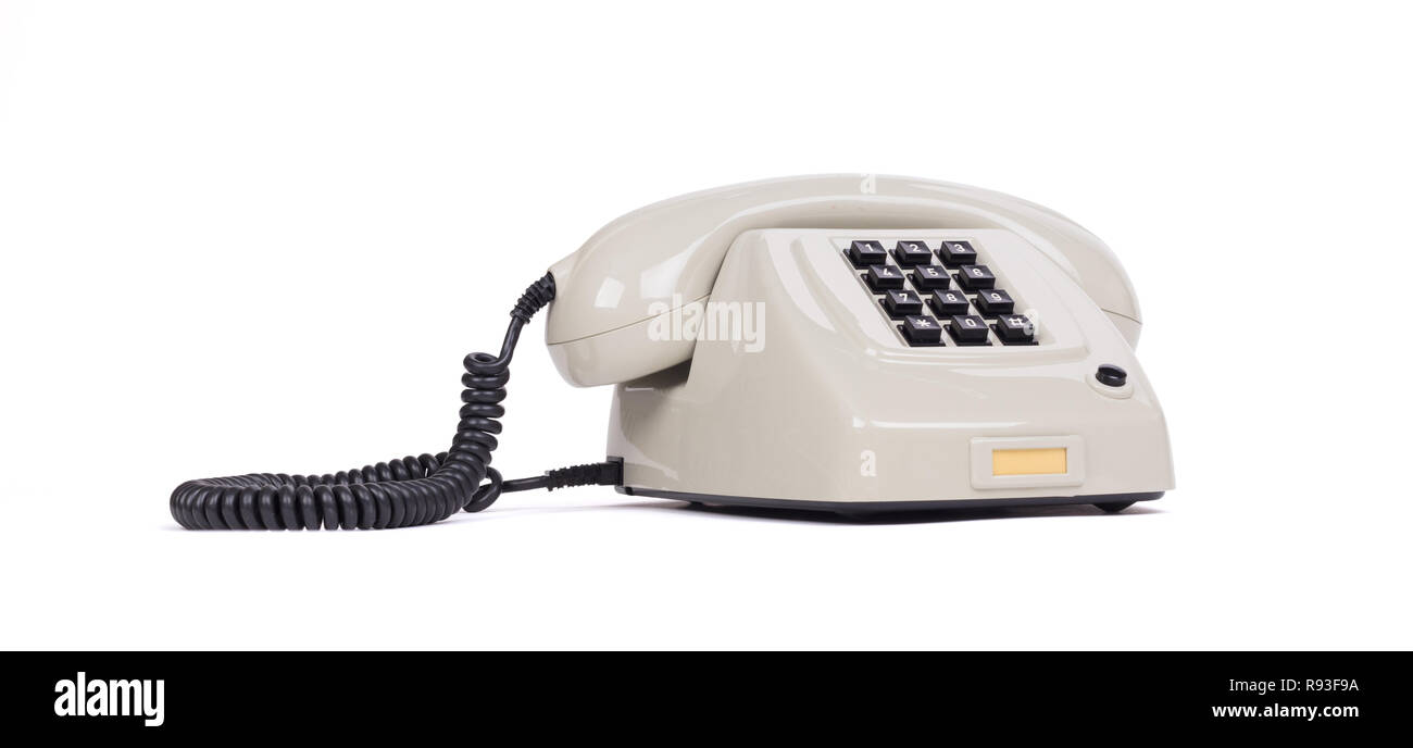 Vintage grey telephone with a white background Stock Photo - Alamy