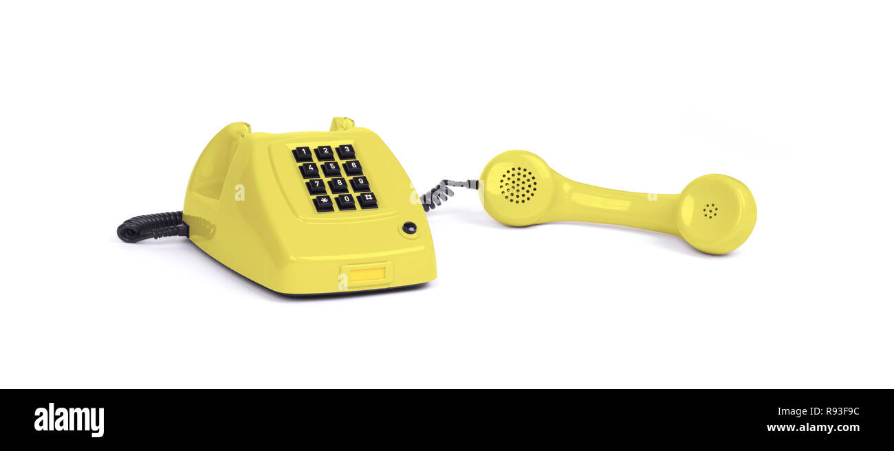 Vintage yellow telephone with a white background Stock Photo - Alamy