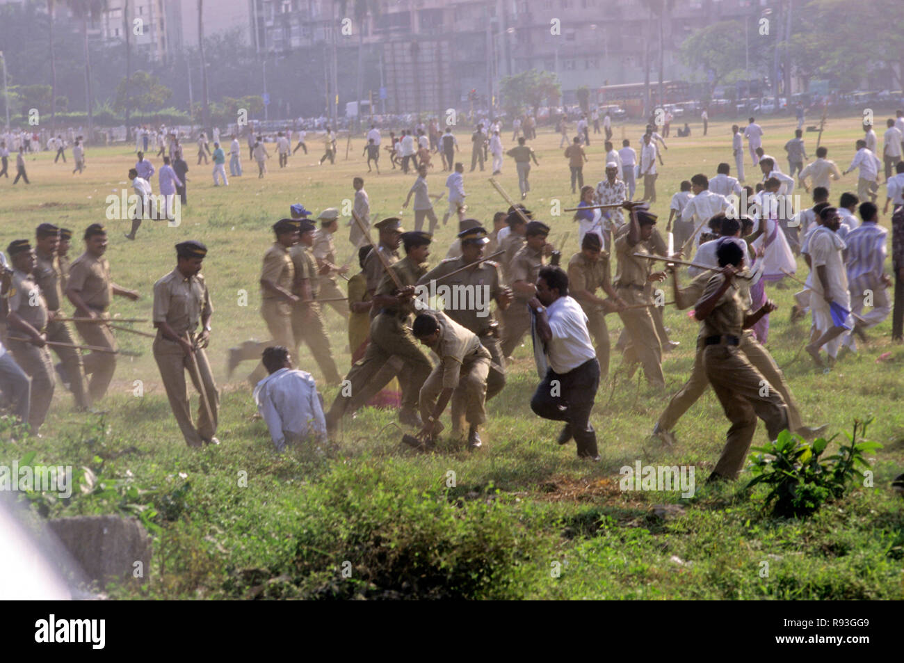 police controlling riot situation, india Stock Photo - Alamy