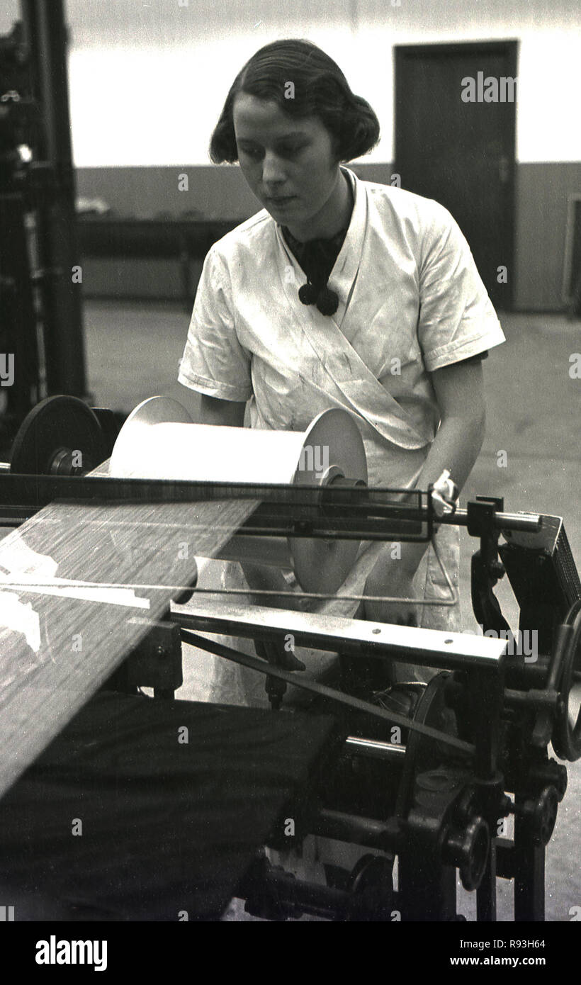 Female operating machine textile factory hi-res stock photography and ...