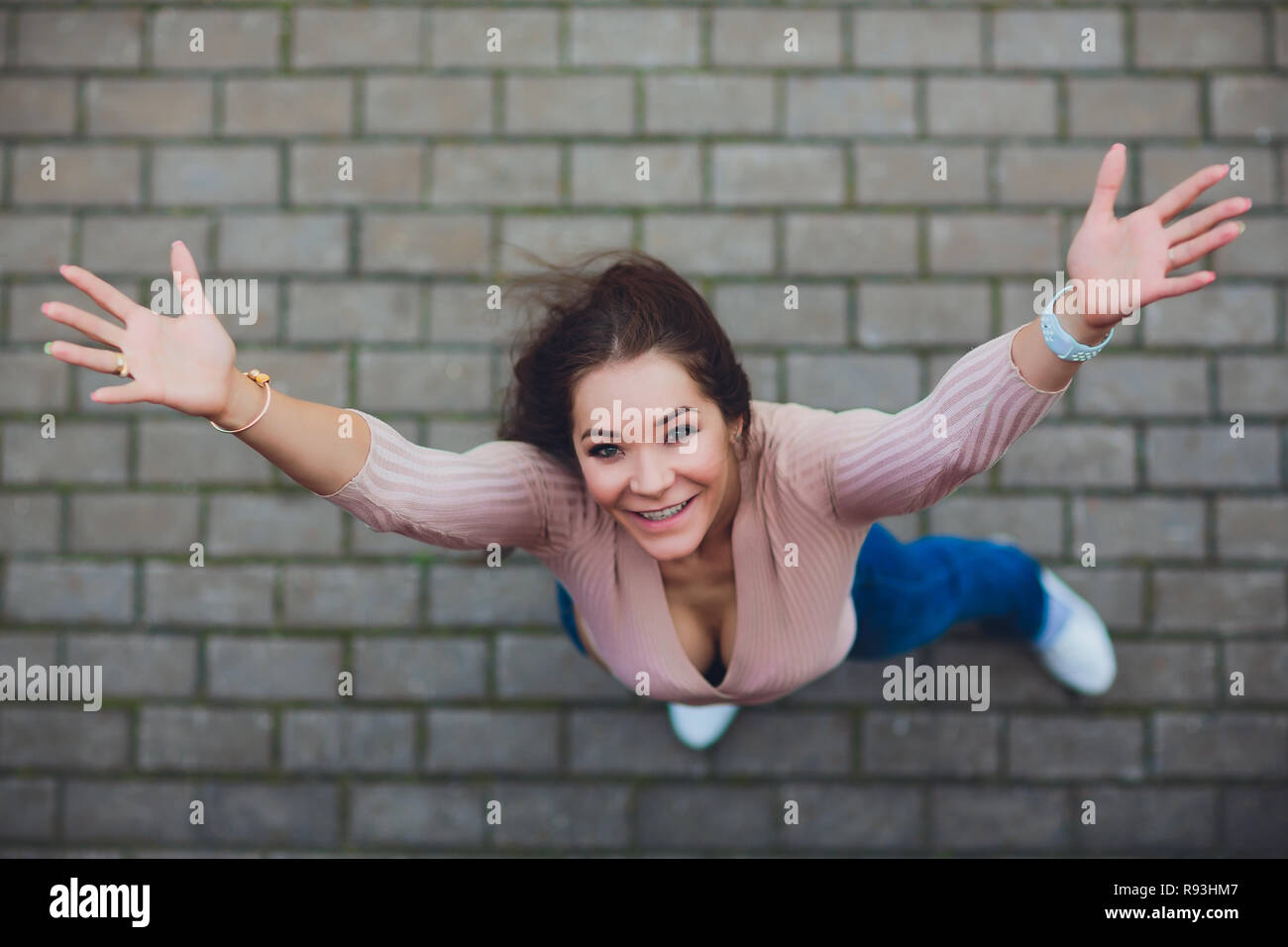 Young smiling teen girl looking camera. Shot from above Stock Photo - Alamy