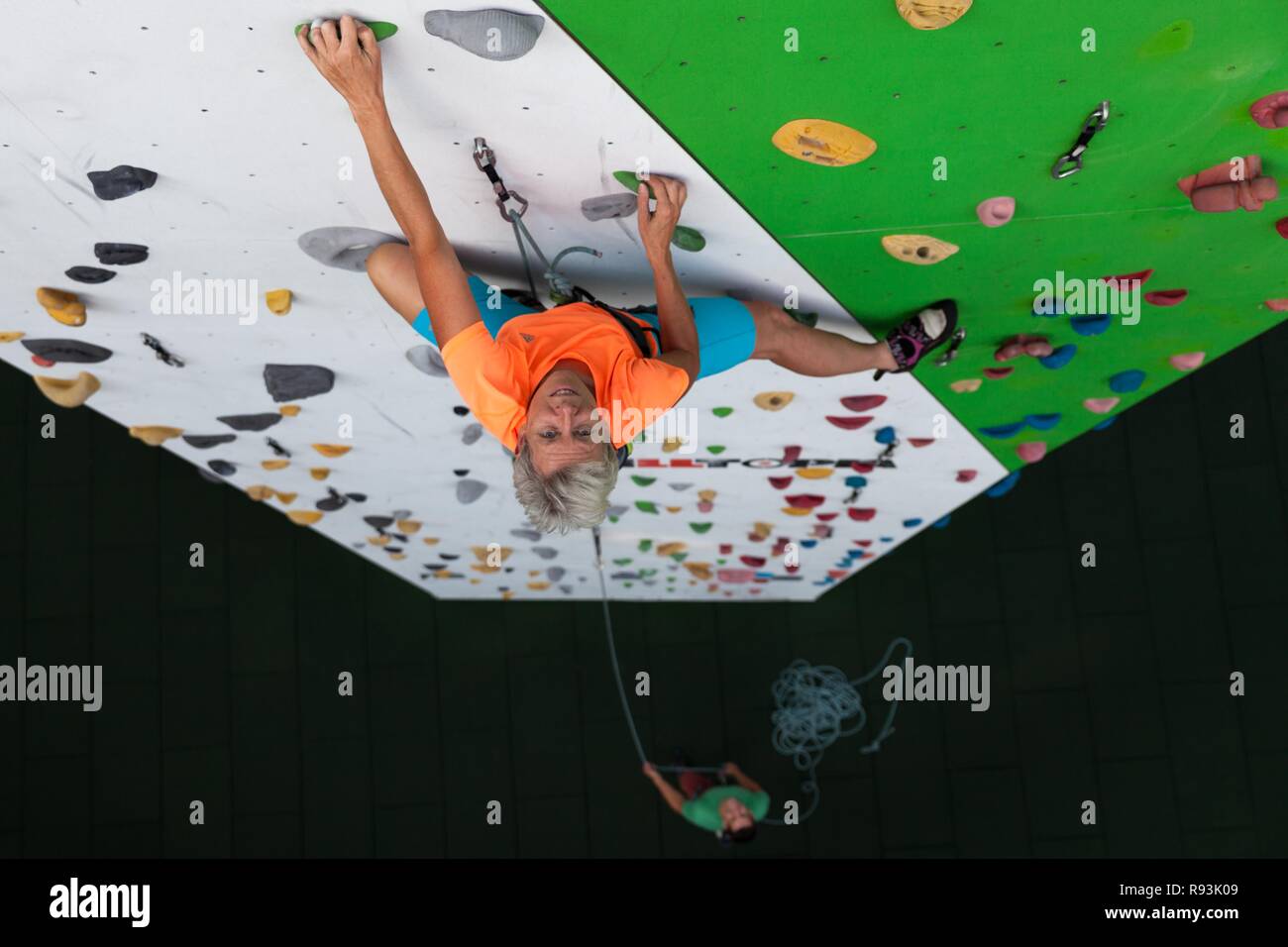 High angle perspective woman climbing hi-res stock photography and ...