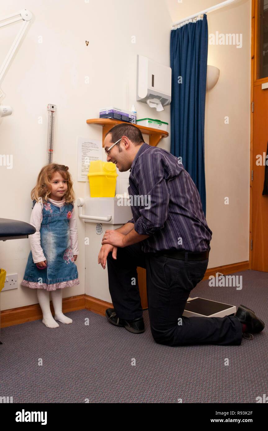 Child's height being measured hi-res stock photography and images - Alamy