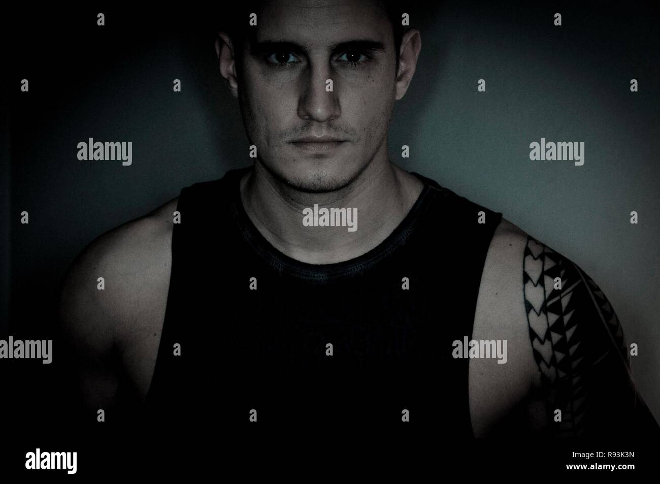 Man in singlet hi-res stock photography and images - Alamy