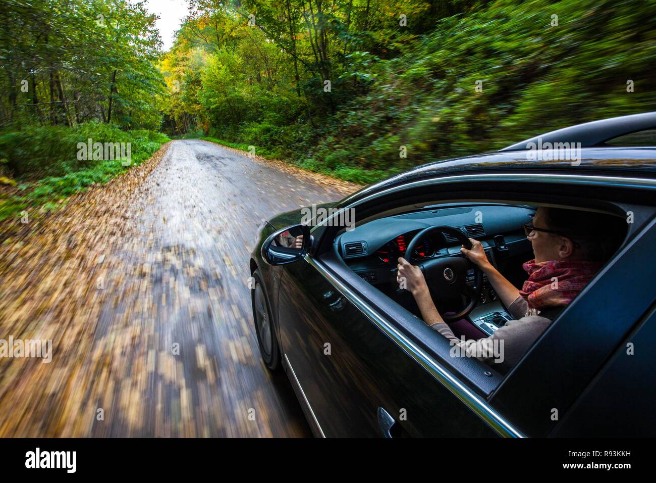 Driving on the street hi-res stock photography and images - Alamy