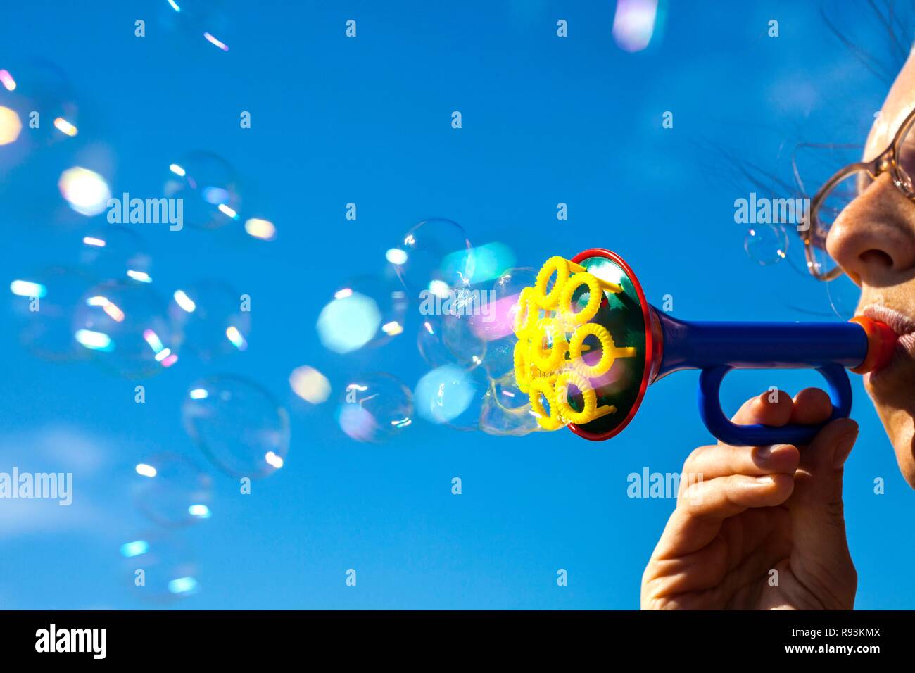 Soap bubbles from a bubble trumpet Stock Photo - Alamy