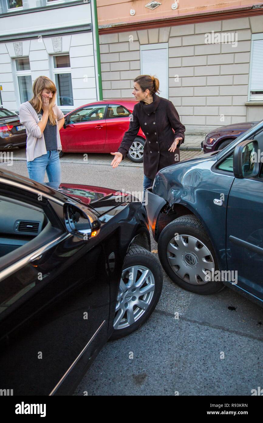 Traffic accident, slight body damage to a car, crash while turning from ...