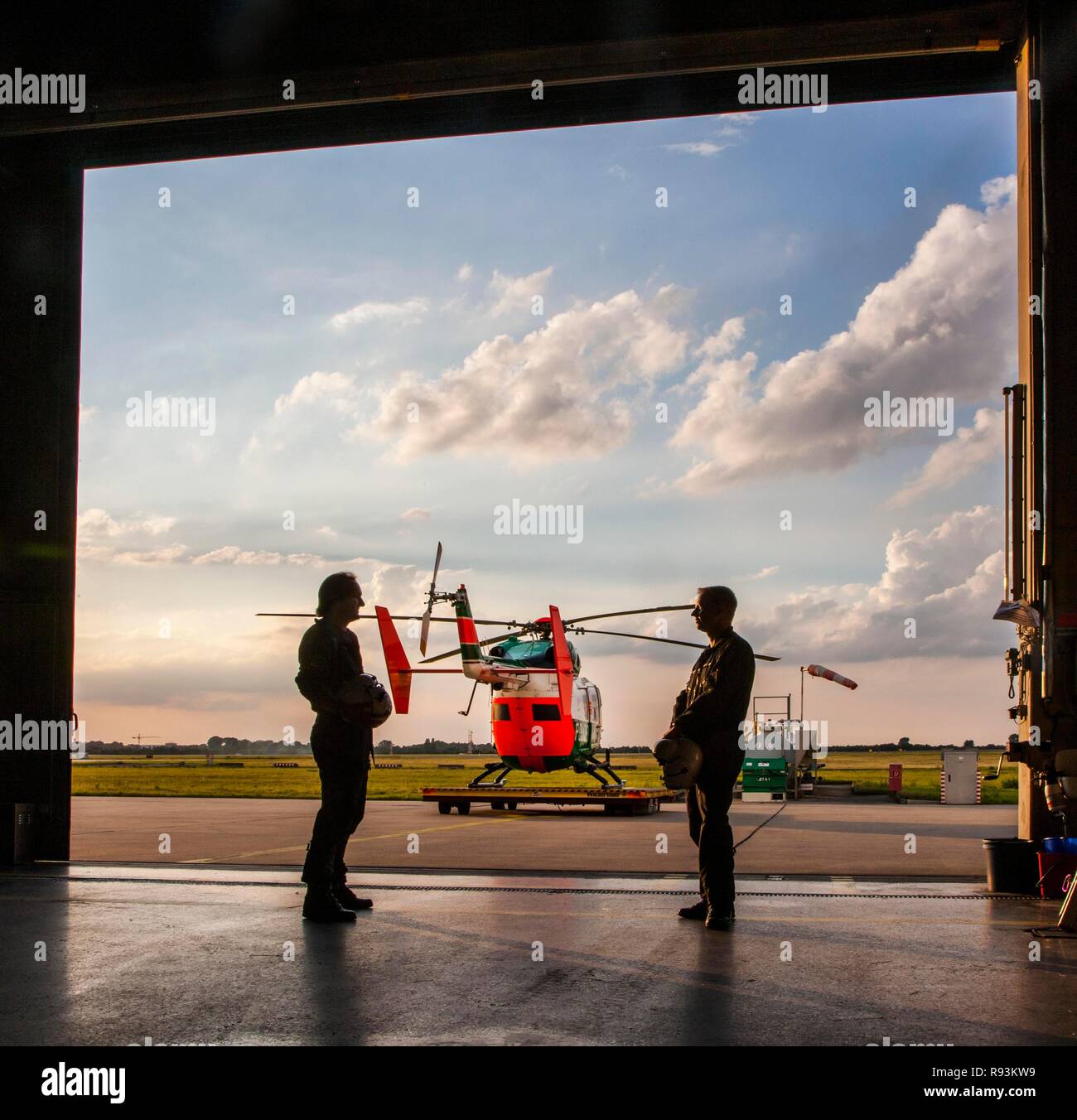 Pilots during a meeting before take-off, police helicopter type BK 117 ...