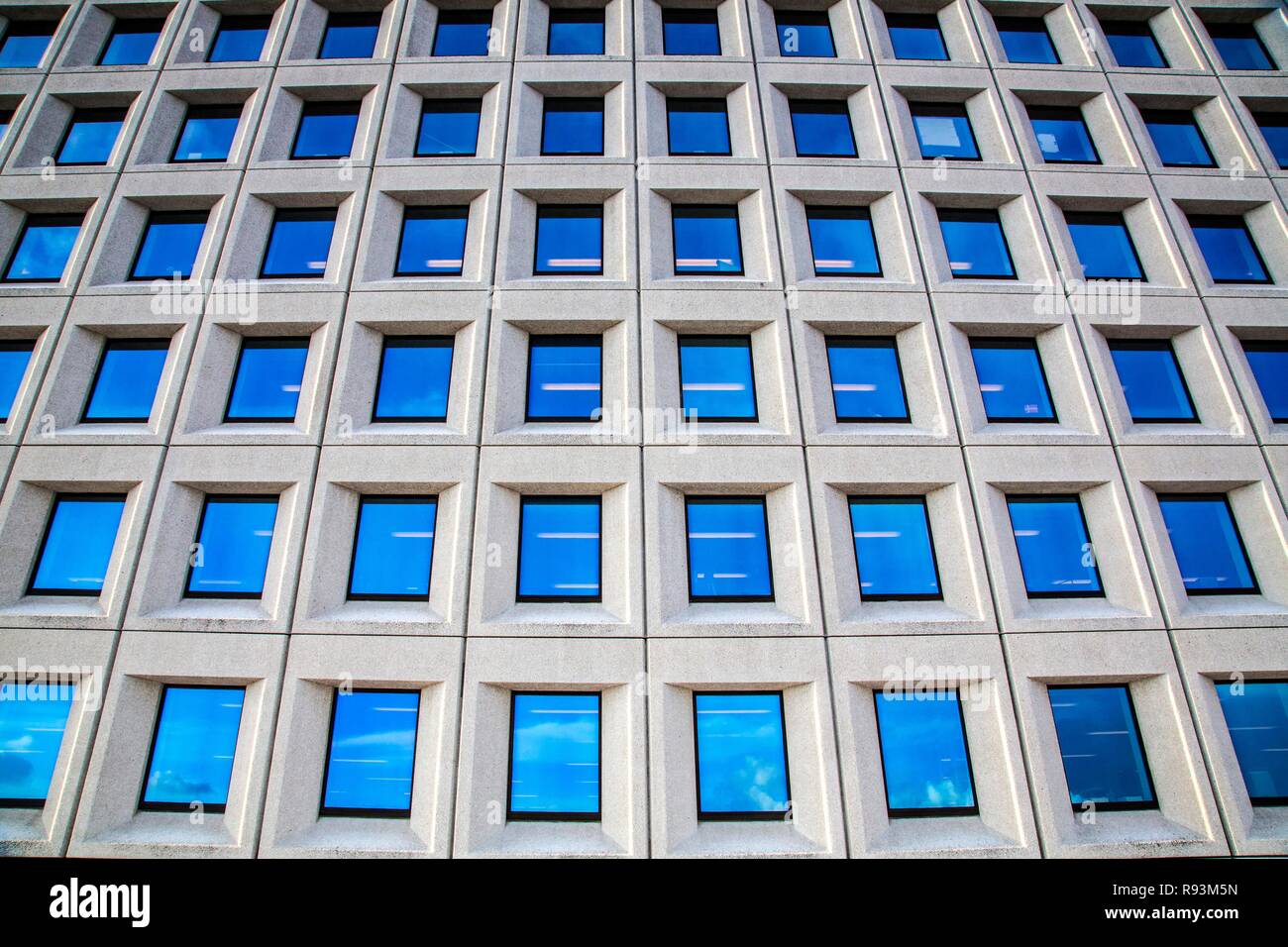 Concrete facade and windows of an office building Stock Photo - Alamy