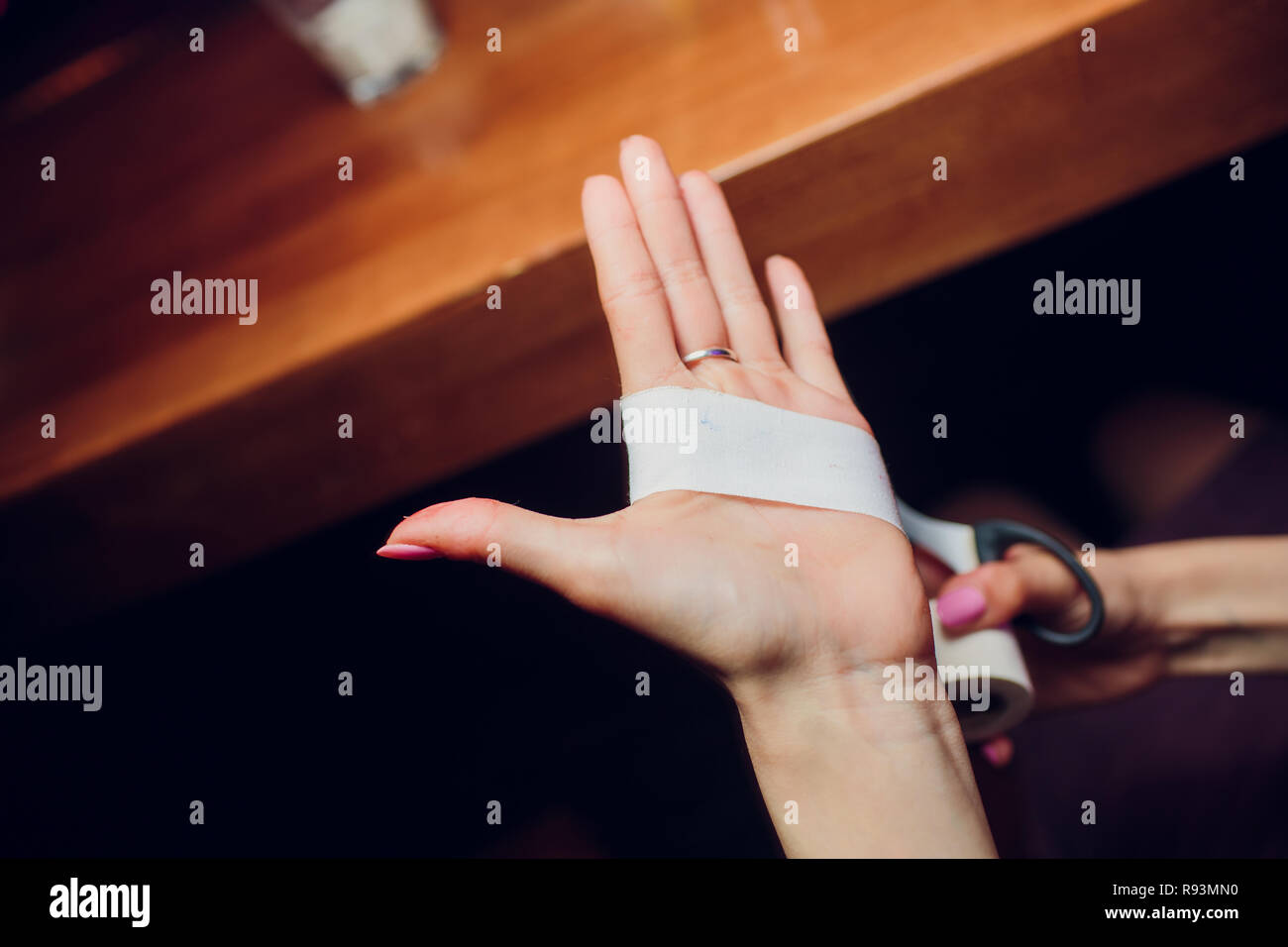 Female hand with first aid plaster Stock Photo - Alamy