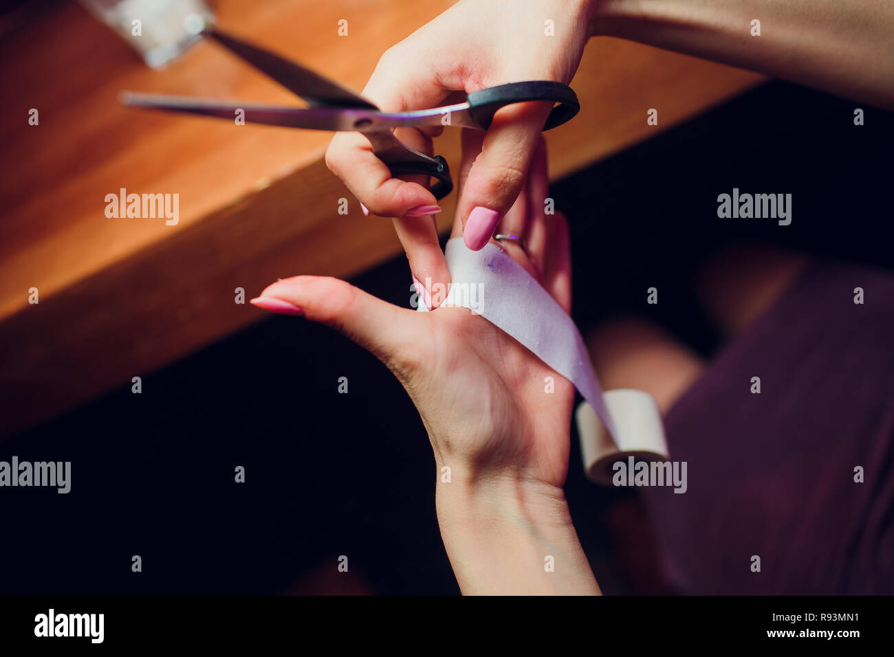 Female hand with first aid plaster Stock Photo - Alamy
