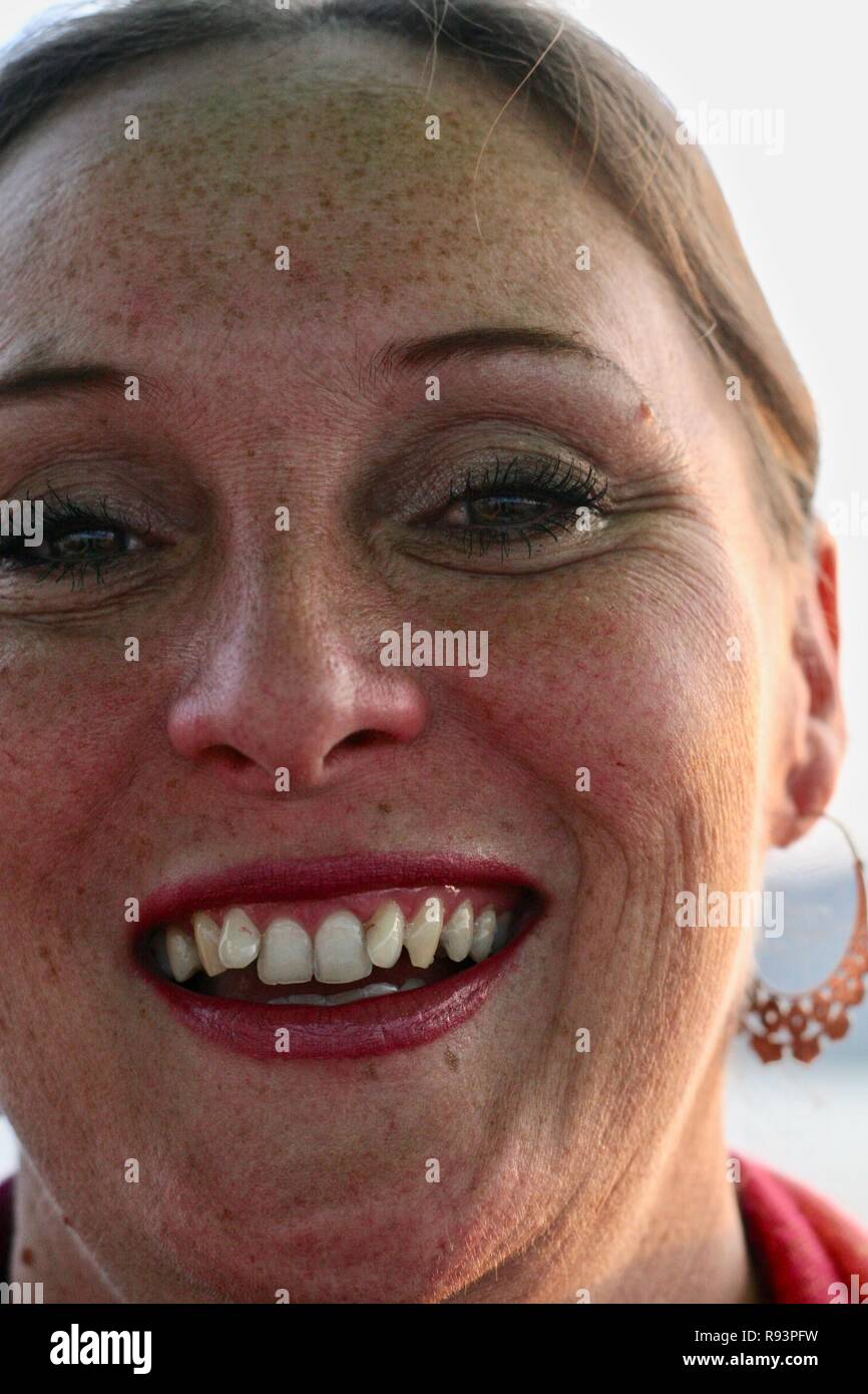 A happy smiling normal woman's face who's happy with life Stock Photo ...