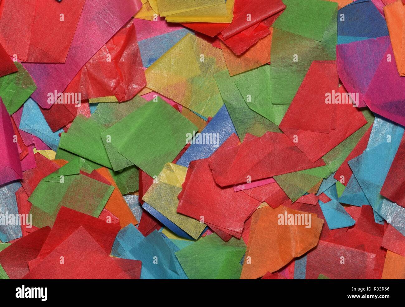 A colorful array of cut tissue paper that has been made into homemade ...