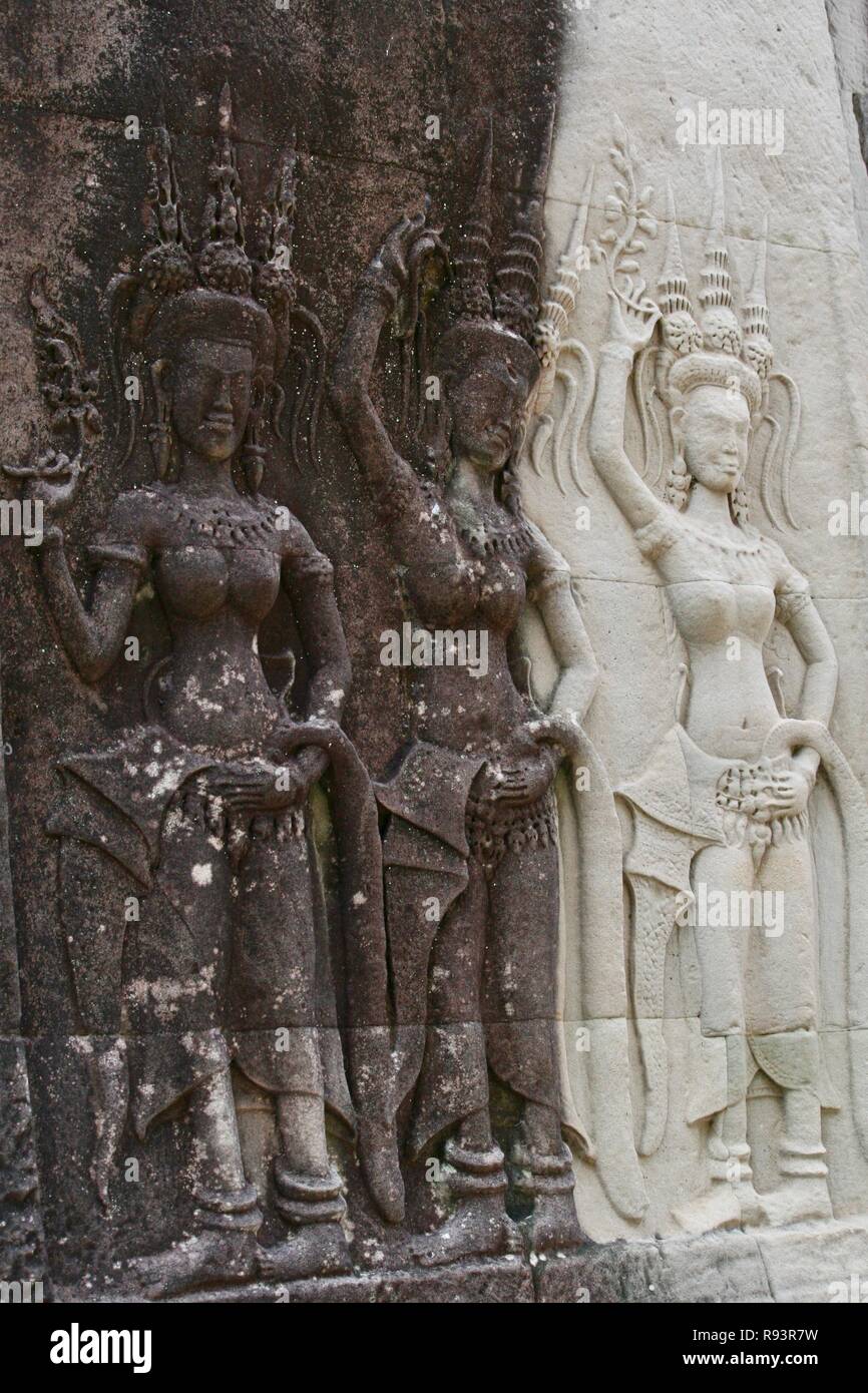 Dancing girls carved into a stone temple wall in Cambodia Stock Photo ...