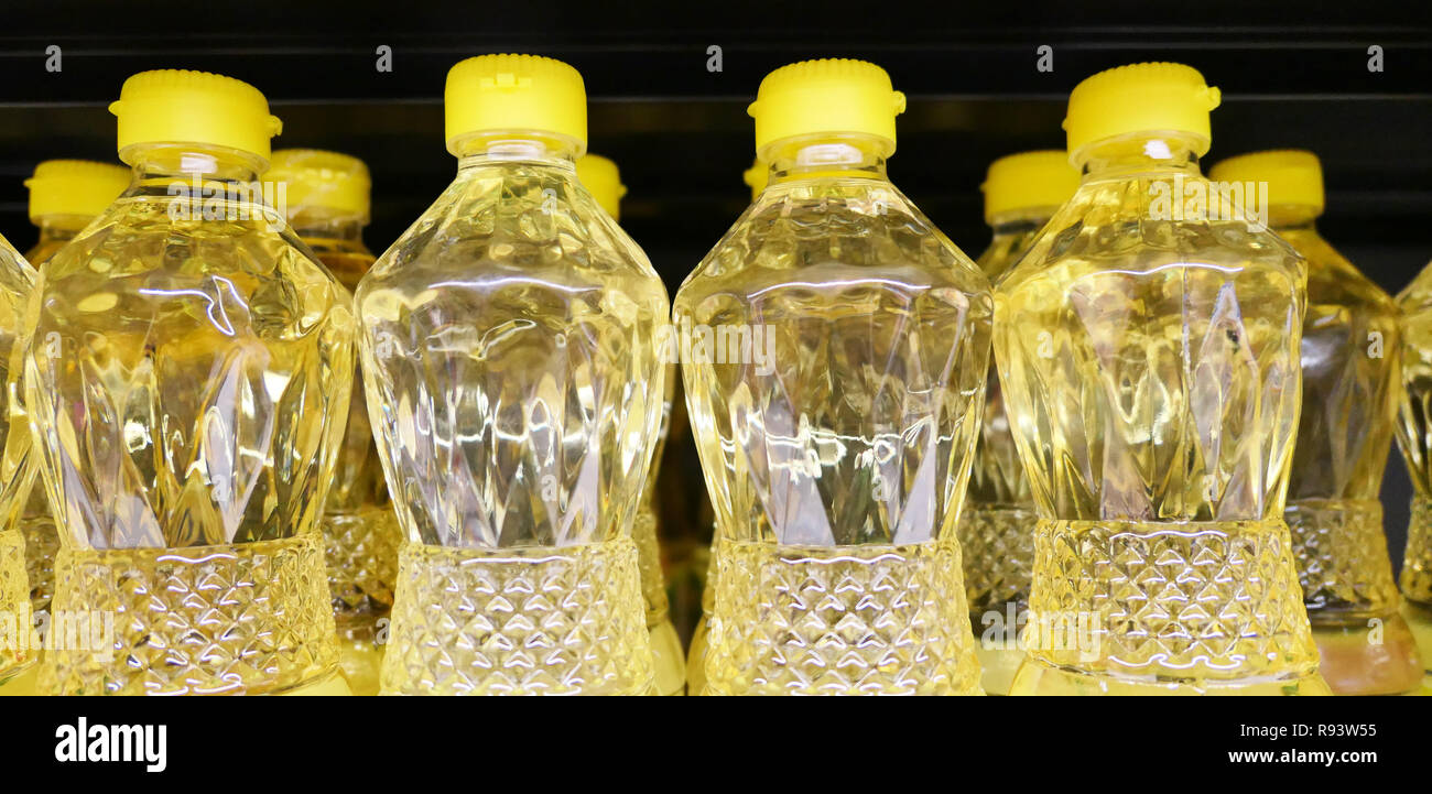 Bottles with vegetable oil Stock Photo - Alamy