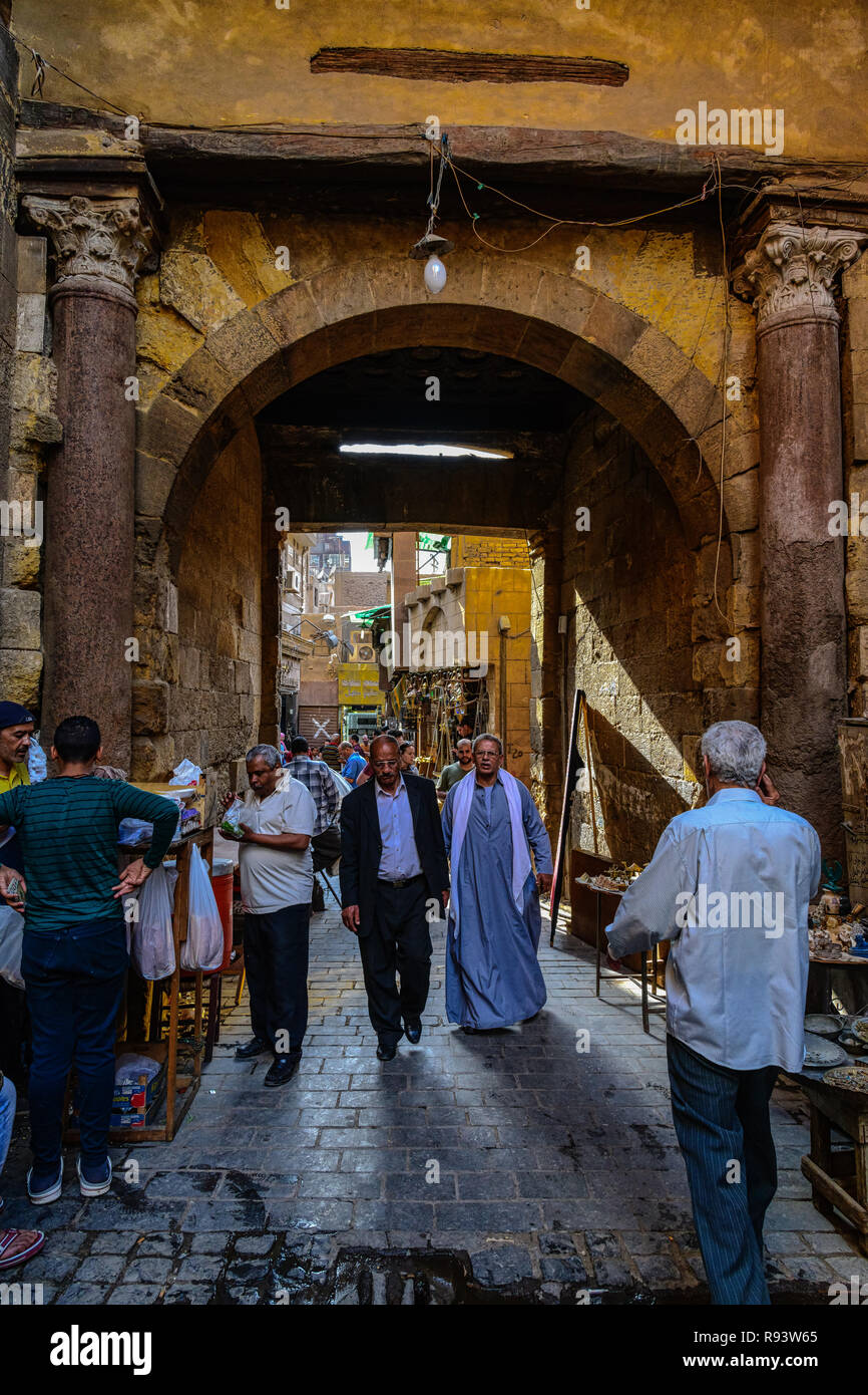 Cairo Street scene and medieval city gate in Khan el-Khalili market ...
