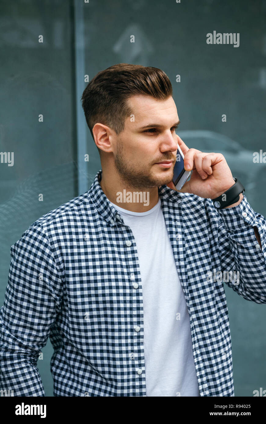 Serious young man talking on hi-res stock photography and images - Alamy