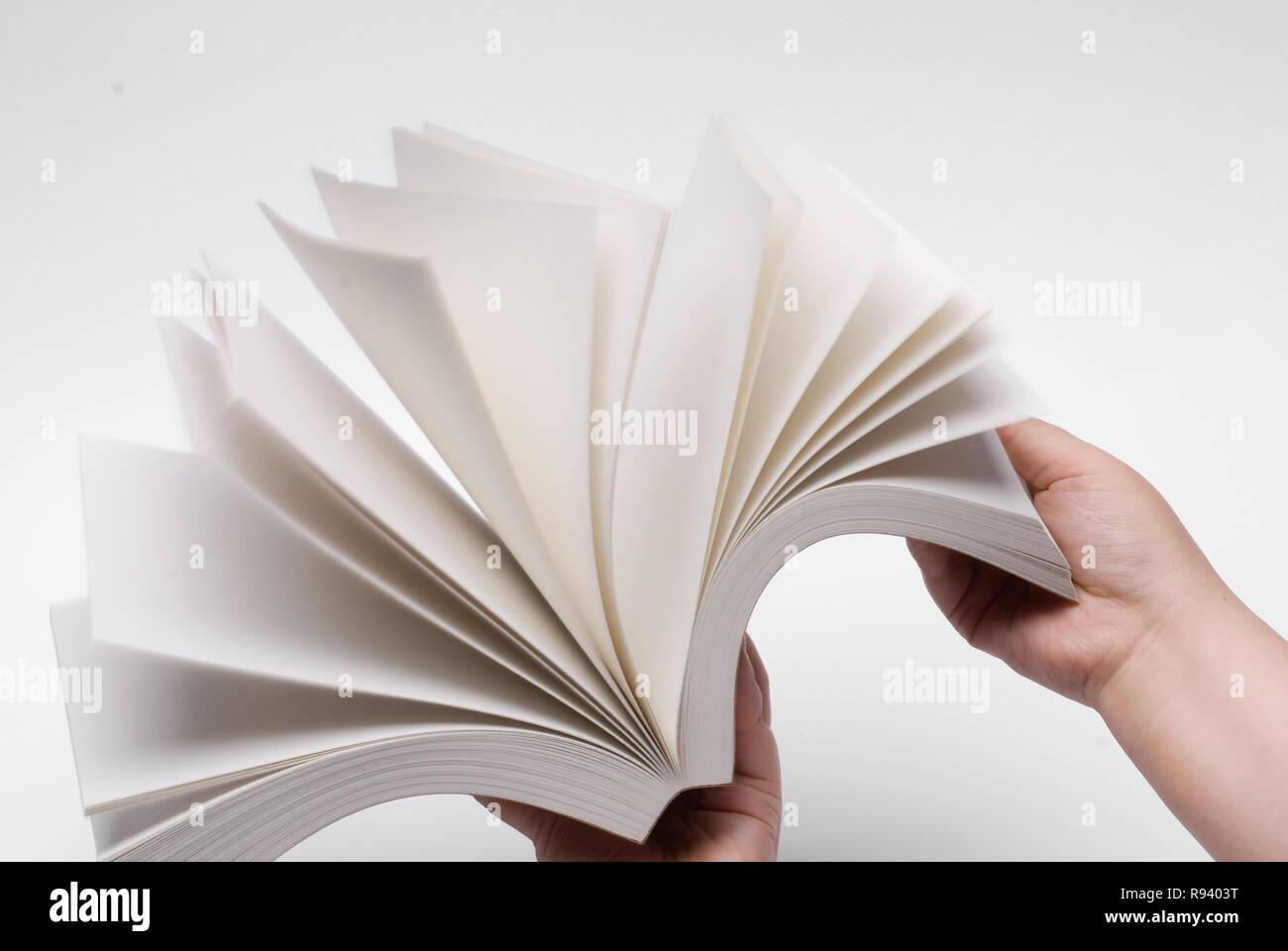 turn over a book Stock Photo - Alamy
