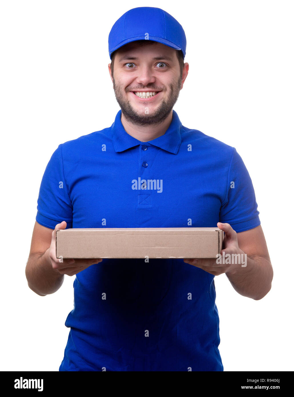 Image of man in blue T-shirt and baseball cap with cardboard box for ...