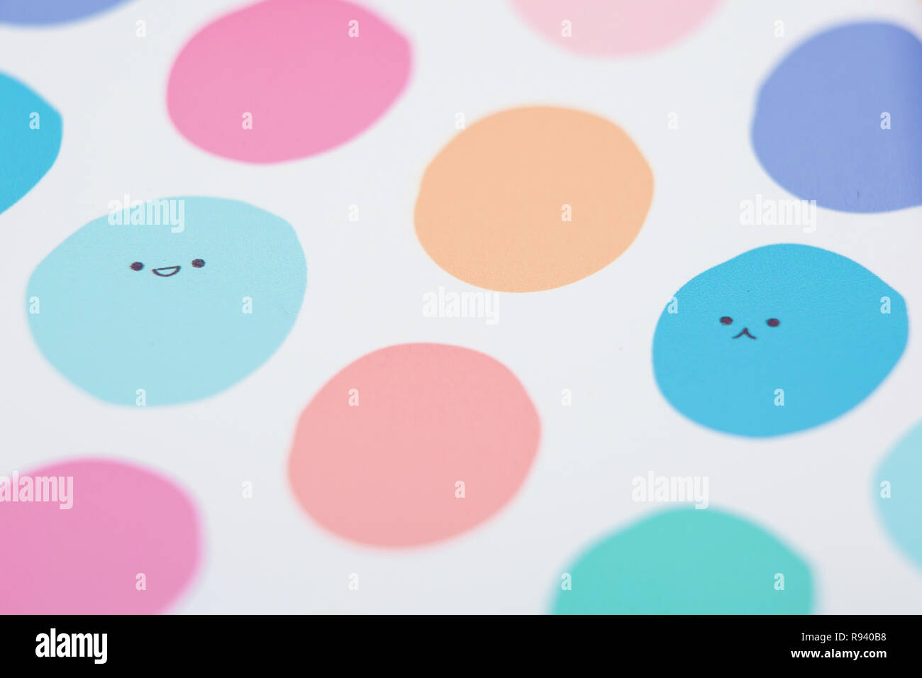 A polka dot pattern and emoticons Stock Photo - Alamy