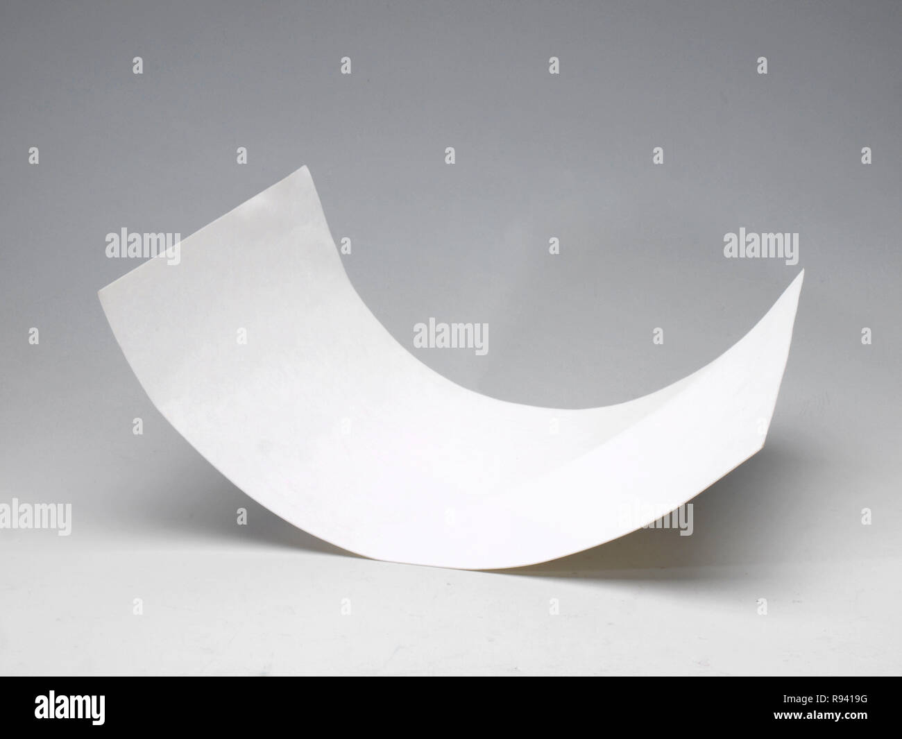 curved sheet of paper Stock Photo - Alamy