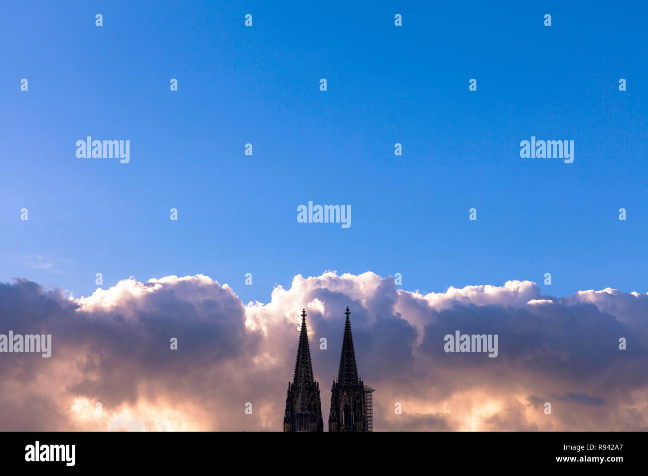 cloud bank and the steeples of the cathedral, Cologne, Germany ...