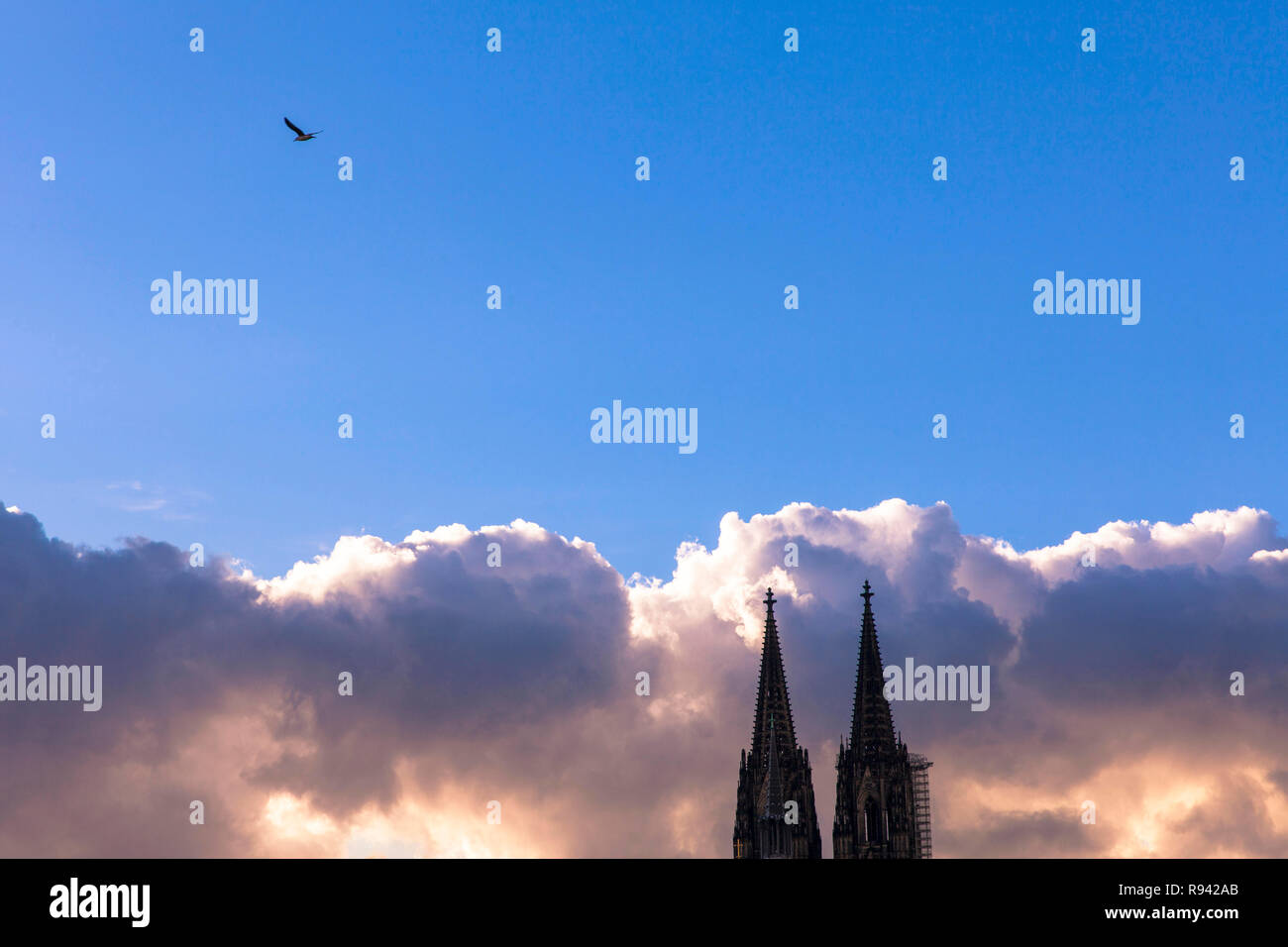 cloud bank and the steeples of the cathedral, Cologne, Germany ...