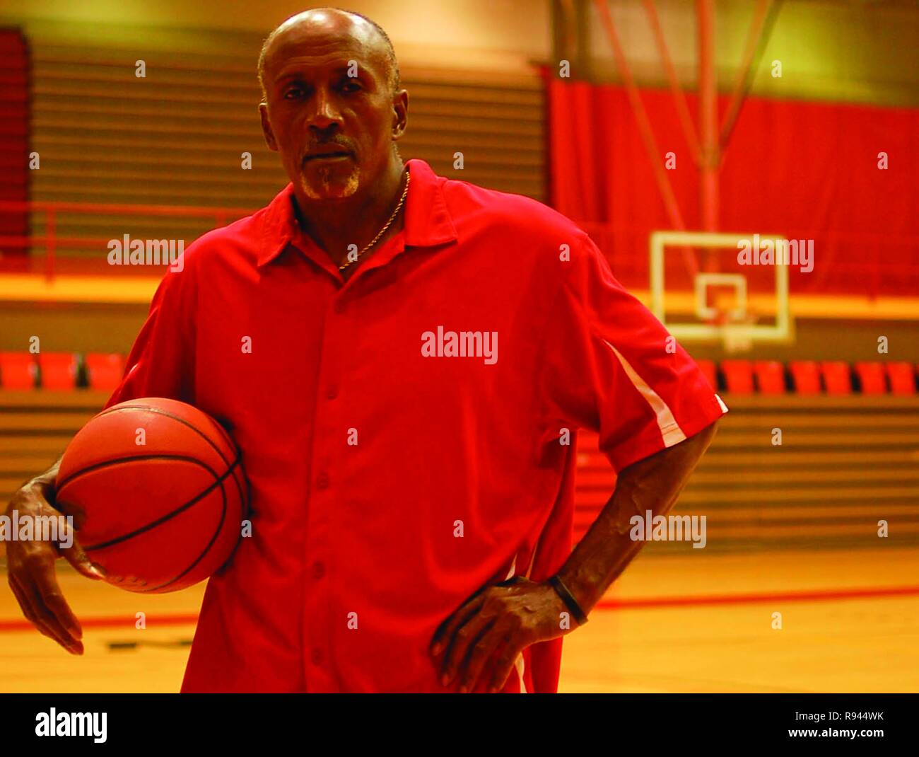 Black male model poses for pictures with a basketball Stock Photo - Alamy