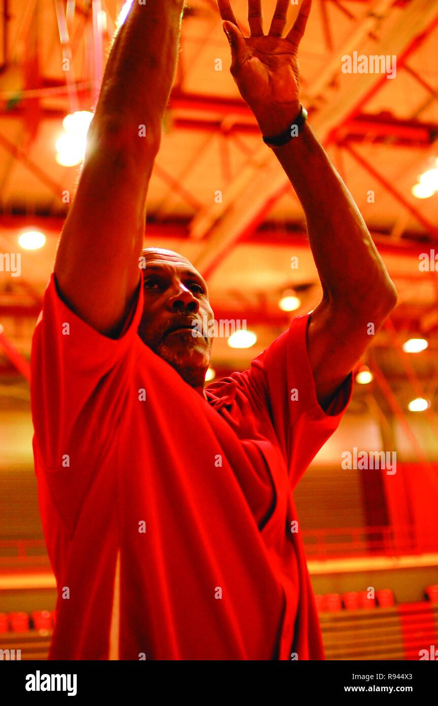 Black male model poses for pictures with a basketball Stock Photo - Alamy