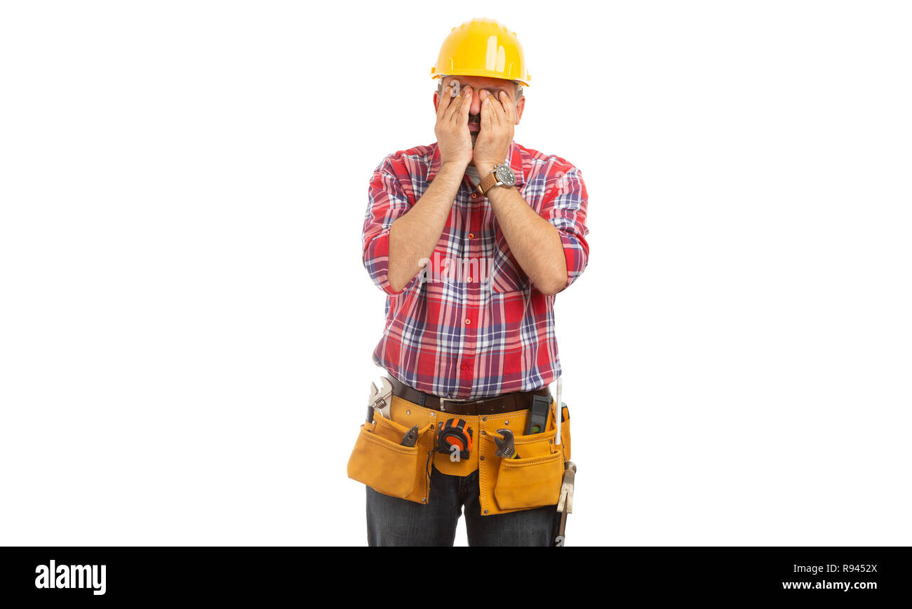 Sleepy builder rubbing eyes with hands as tiresome concept isolated on ...