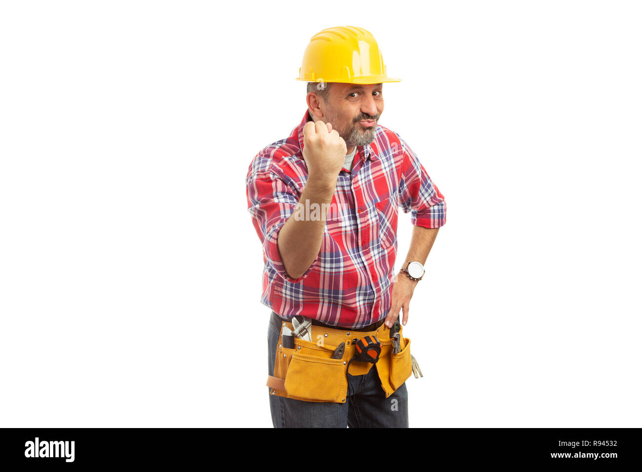 Mocking construction worker making null gesture with thumb inside fist ...