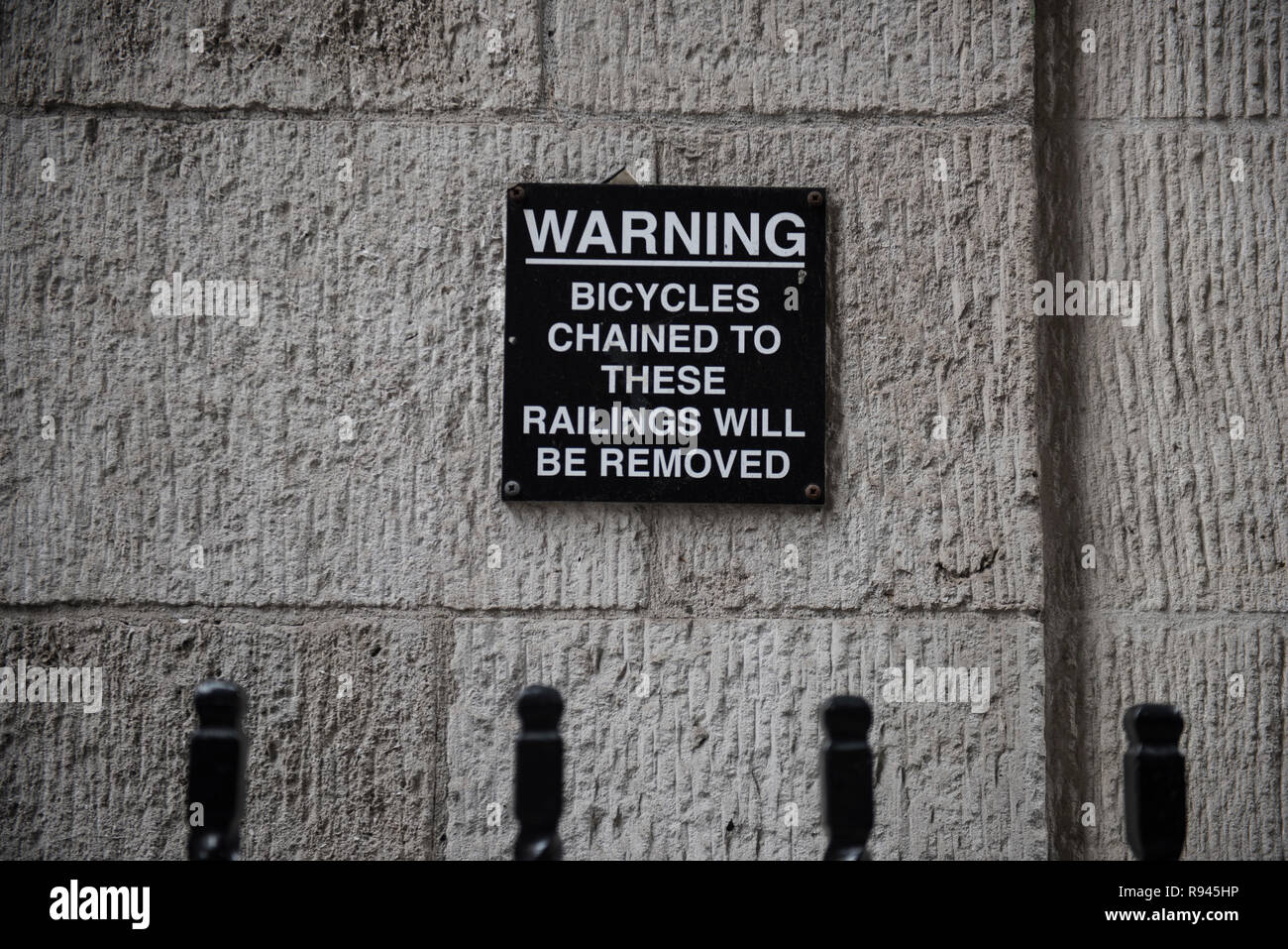 Warning Sign on Wall Stock Photo - Alamy